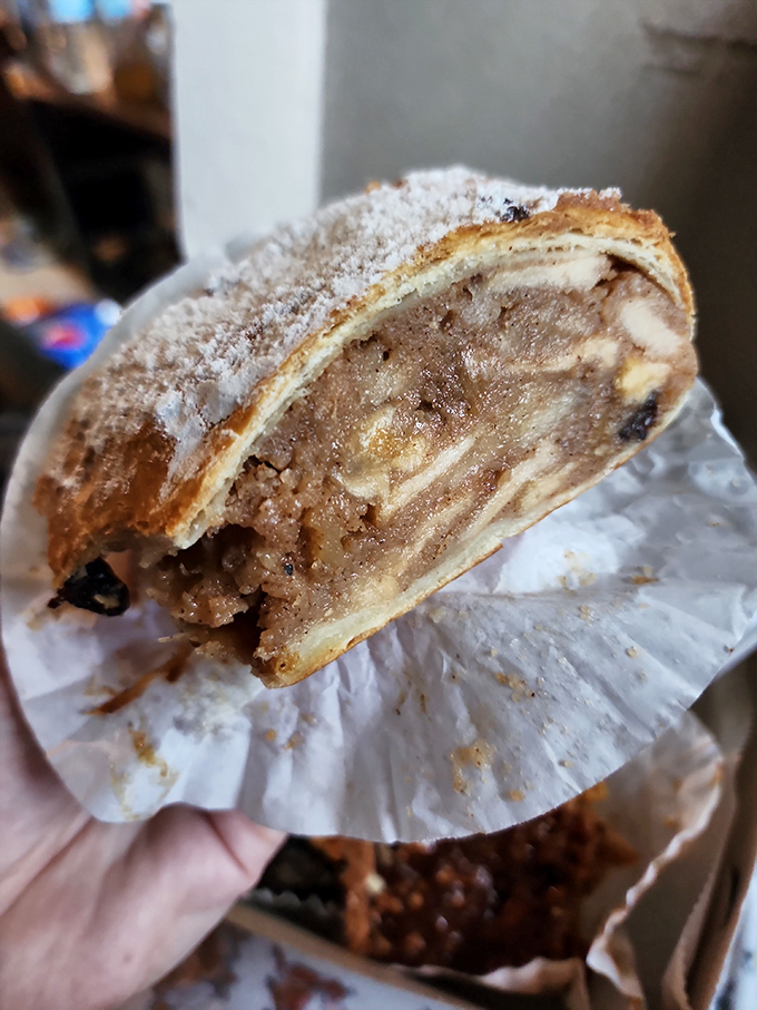 This isn't just apple strudel—it's edible architecture. Layers of flaky pastry and spiced apples that would make even the most stoic German smile.