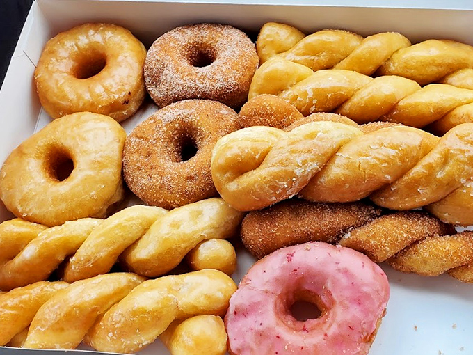 A box of twisted, glazed, and sugar-dusted treasures that proves variety isn't about exotic ingredients but mastering the classics with quiet confidence.