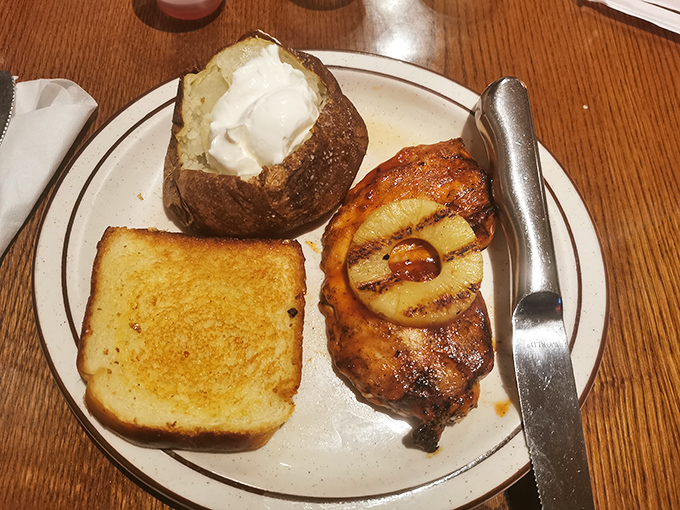 This isn't just barbecue chicken; it's what happens when poultry meets patience and a pitmaster who understands the language of smoke.