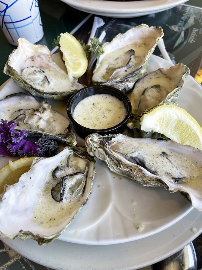 Fresh oysters arranged like a pearl necklace, each one a briny treasure from Morro Bay's clean waters. That dipping sauce deserves its own fan club.