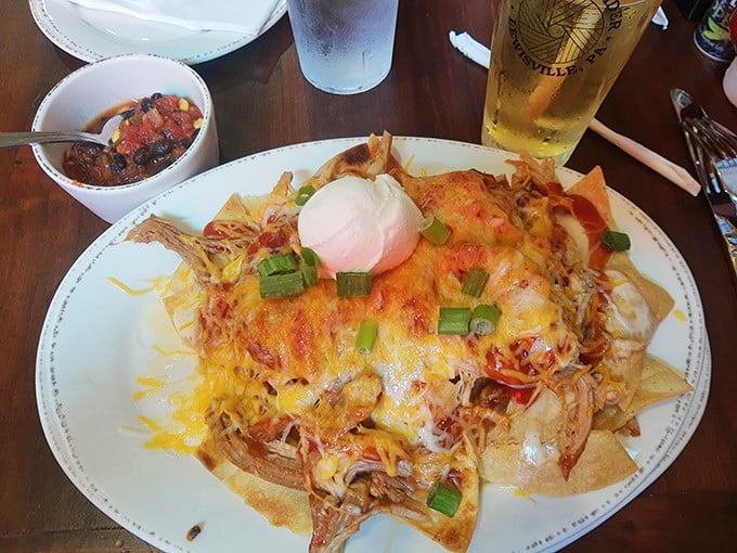 BBQ nachos that solve the eternal question: "How do we make pulled pork even better?" The answer: melt cheese over it and add a dollop of sour cream.