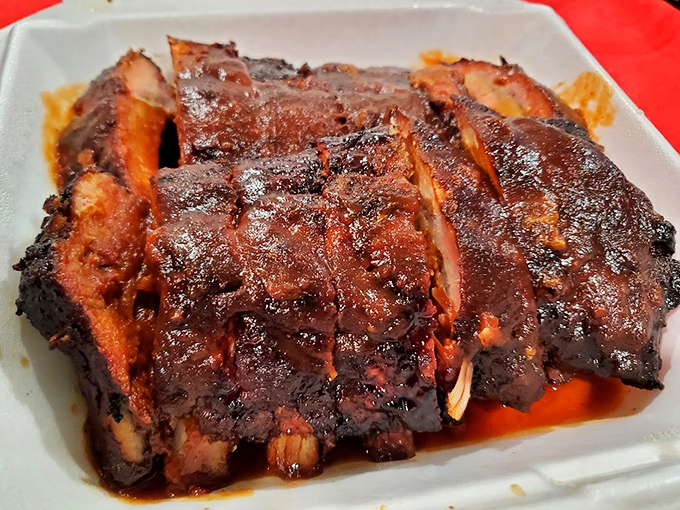 Ribs so perfectly lacquered they belong in a museum, except museums don't let you devour the exhibits with such gleeful abandon.
