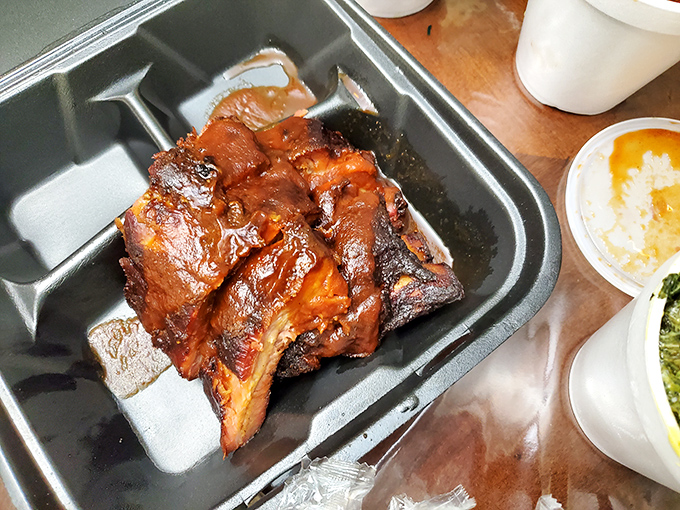 These ribs have clearly been introduced to heat and smoke under just the right circumstances, like a perfect first date that lasted 12 hours.