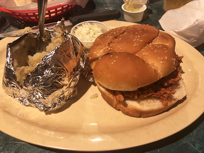 The BBQ sandwich doesn't need fancy presentation&mdash;it's too busy being absolutely delicious. That tin-foil potato is practically bursting with anticipation.