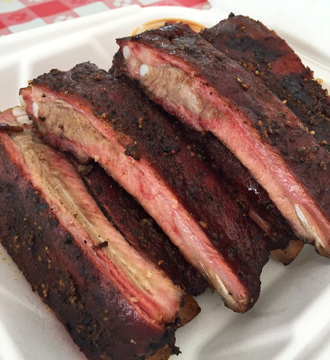 These ribs don't just fall off the bone &ndash; they practically leap into your mouth with a smoky, spicy enthusiasm that's downright infectious.