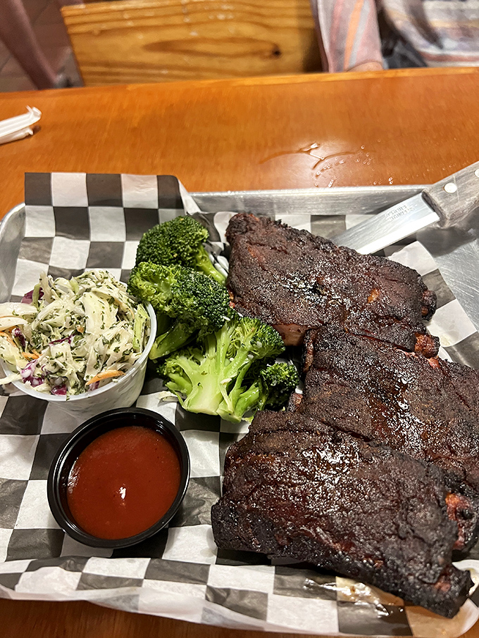 Who knew a seafood joint could nail barbecue too? These ribs look like they'd make a Texan tip their hat in respect.