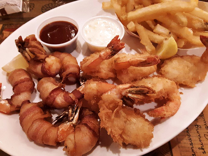 The eternal debate: coconut or bacon-wrapped shrimp? The correct answer at Dixie Crossroads is obviously "both," preferably with extra dipping sauce.