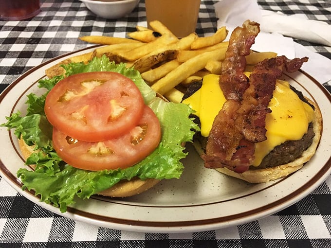 This isn't just a burger&mdash;it's a masterpiece of melted cheese, crispy bacon, and a perfectly toasted bun that requires both hands and zero shame.