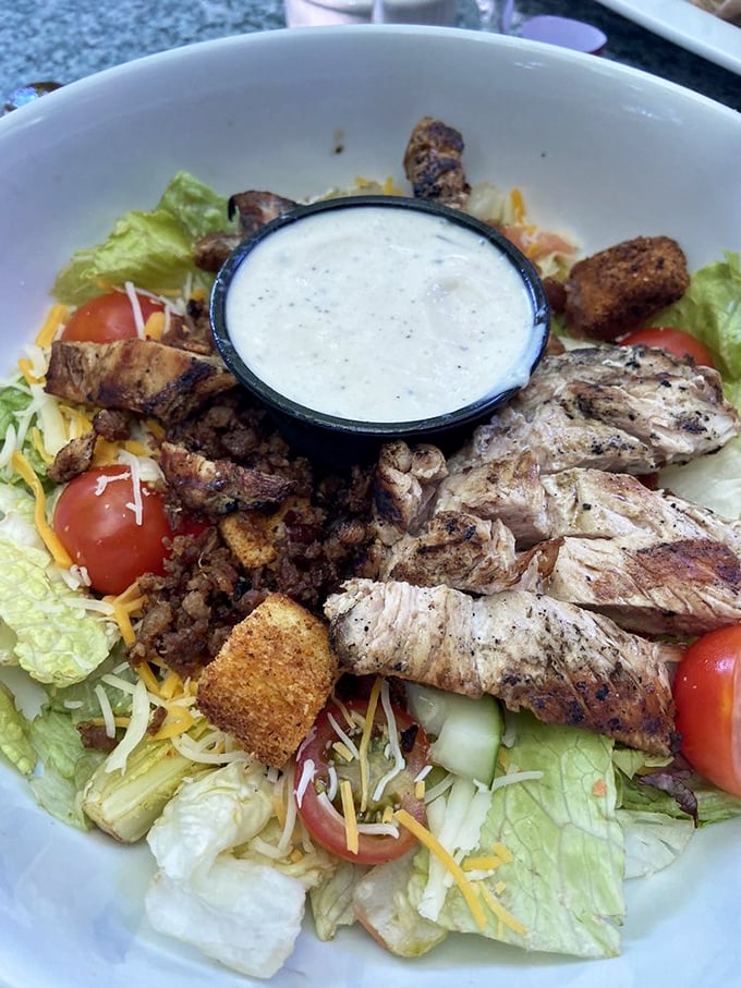 This isn't just a salad—it's a protein party where lettuce got invited. That creamy dressing in the center is the life of the party.