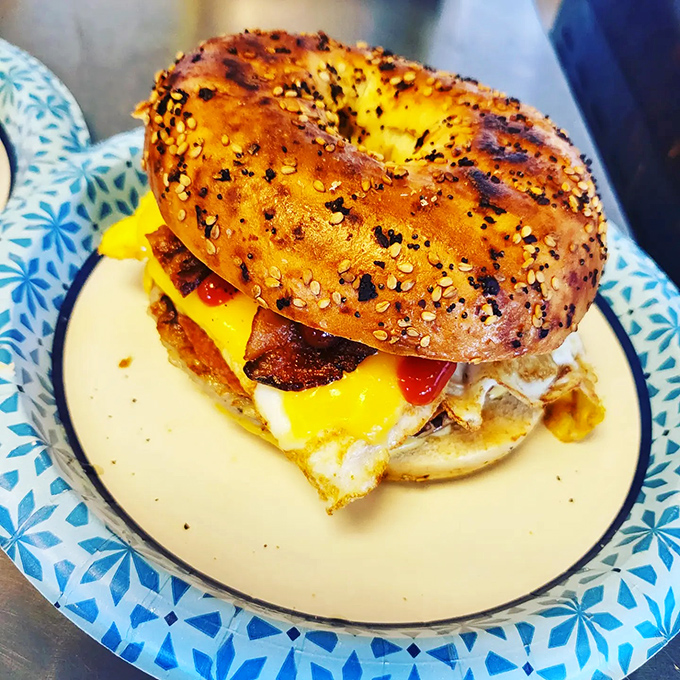 Breakfast ambition in bagel form. That everything bagel with egg, cheese, and bacon is what morning dreams are made of—crispy, gooey, and utterly satisfying.