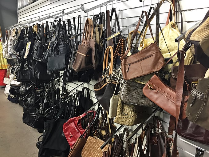 Handbags hanging like ripened fruit, ready for picking. From corporate boardroom to bohemian festival, there's a leather companion waiting for everyone.