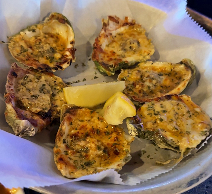 These baked oysters aren't just appetizers; they're little boats of joy sailing on waves of butter and cheese.