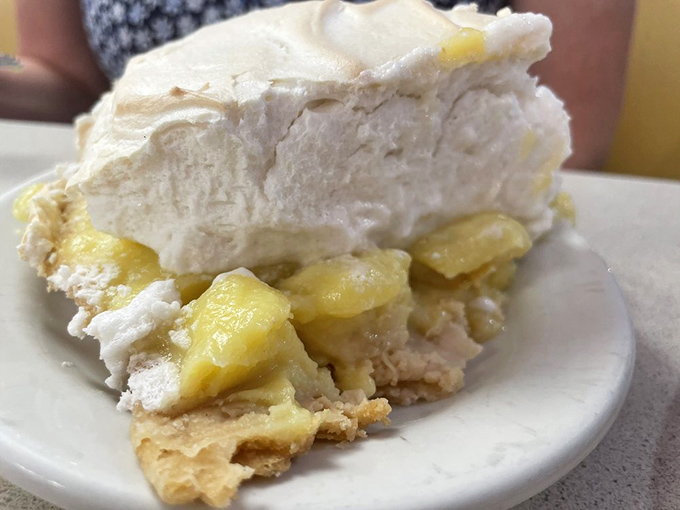 Banana cream pie with a cloud of whipped topping so light it might float away if not anchored by that perfect crust.