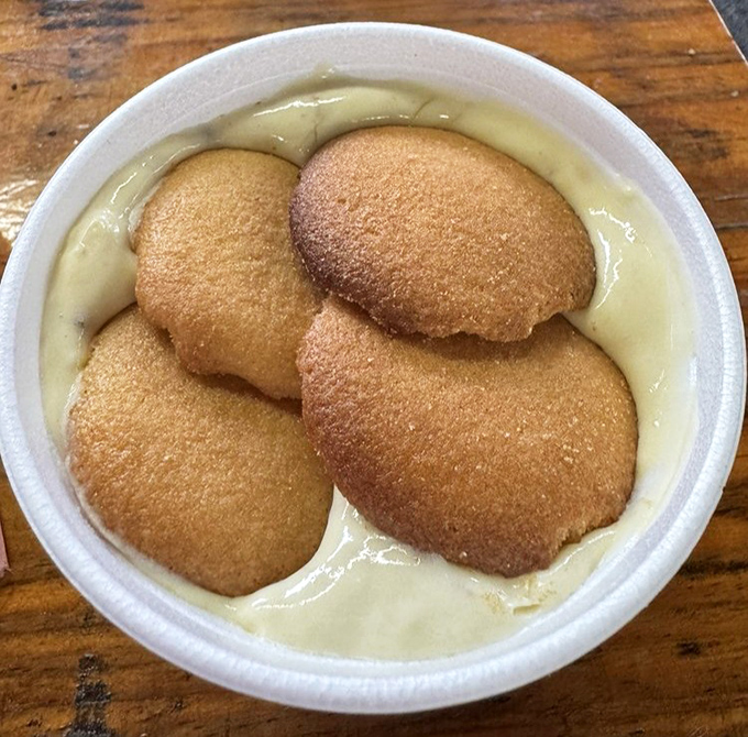 Banana pudding that whispers, "Save room for me." Those vanilla wafers floating like little lifeboats in a sea of comfort and nostalgia.