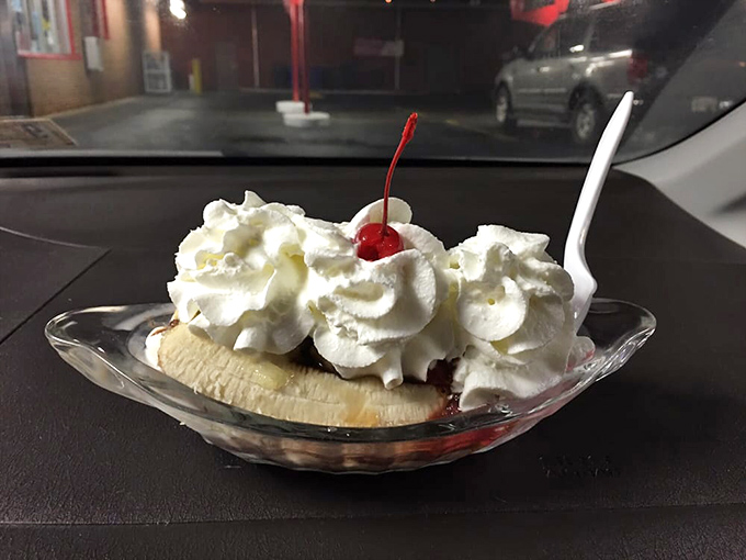 This banana split isn't just dessert, it's a childhood memory served in a glass boat, sailing straight to your happiness receptors.