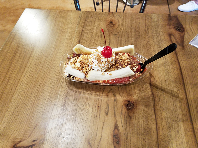 This banana split isn't just dessert, it's a celebration on a plate. The cherry on top is basically wearing a party hat.