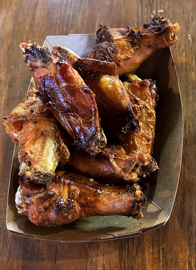 These smoked wings have that mahogany shine that says, "Yes, we've been transformed by fire and wisdom into something transcendent."