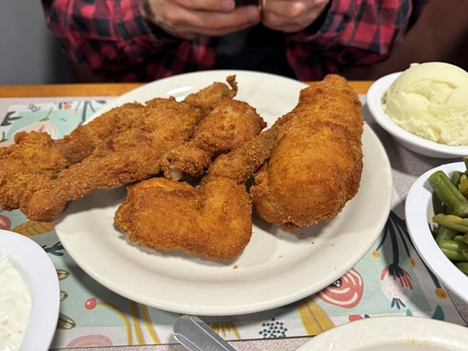 Barberton chicken isn't just fried chicken&mdash;it's a master class in crispy exteriors protecting juicy interiors, with sides playing crucial supporting roles.