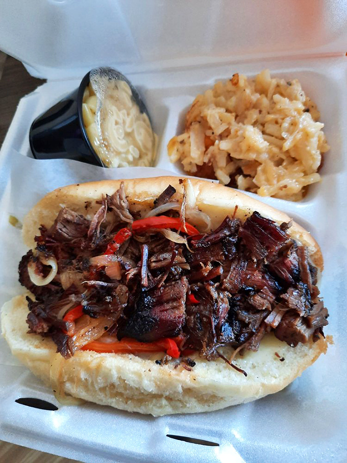 When a Philly cheesesteak goes to barbecue school, this is the delicious result&mdash;smoky brisket nestled in a pillowy roll with mac and cheese riding shotgun.