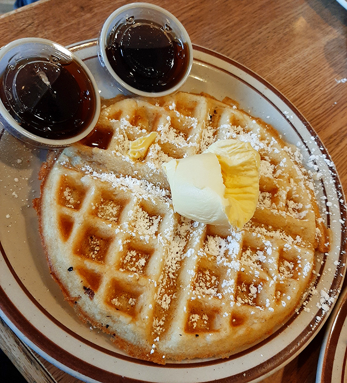 Waffles with the perfect grid pattern&mdash;nature's way of creating syrup reservoirs. Those two cups of syrup aren't a suggestion, they're a challenge.