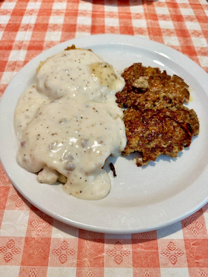 Biscuits and gravy: the Southern breakfast that hugs you from the inside, with pepper-speckled gravy cascading over crispy-edged patties.