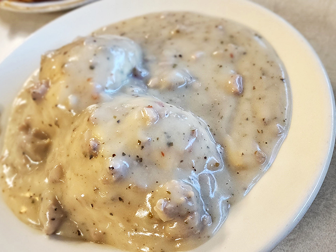 Biscuits and gravy: where pepper-speckled country gravy cascades over fluffy islands of dough&mdash;the breakfast equivalent of a warm hug from someone who truly gets you.