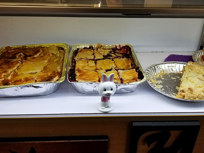 Not all heroes wear capes. Some come in aluminum trays bearing the sweet-tart comfort of bubbling blackberry fillings under golden pastry.