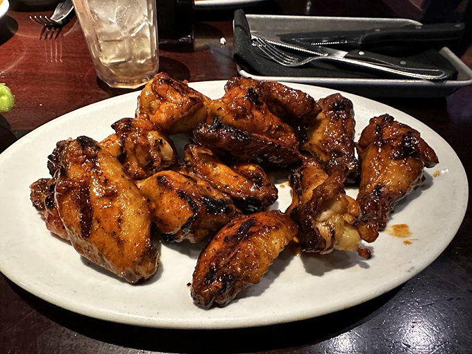 Wings that make you understand why humans evolved opposable thumbs. Crispy, saucy perfection worth getting your fingers sticky for.