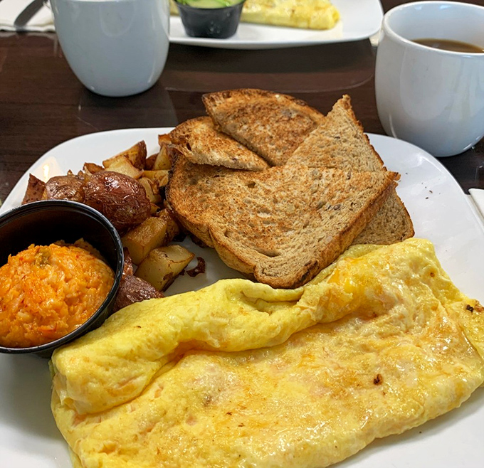 The breakfast platter that answers the eternal question: "Why choose one delicious thing when you can have three?"