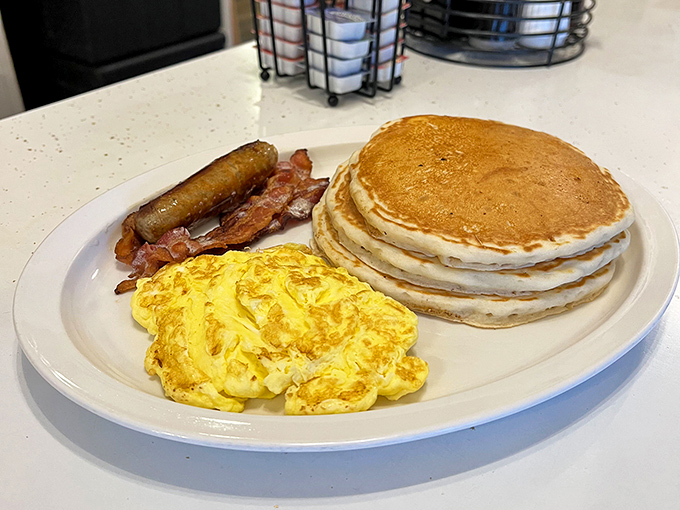 The holy trinity of breakfast: golden pancakes, perfectly scrambled eggs, and bacon. Simple? Yes. Life-changing? Also yes.