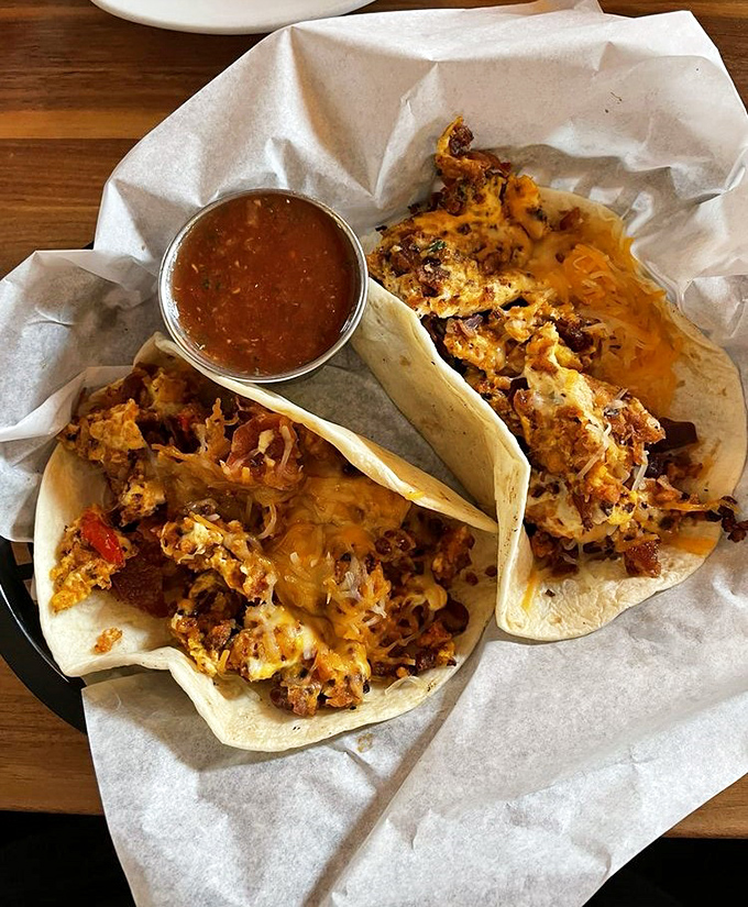 Breakfast tacos that make you question why anyone would ever eat anything else before noon – cheese melting like it's auditioning for a food commercial.
