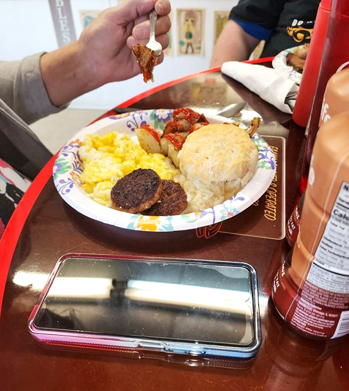 The breakfast plate that launched a thousand food dreams. Sausage patties, scrambled eggs, and a biscuit that could make a grown person cry tears of joy. 