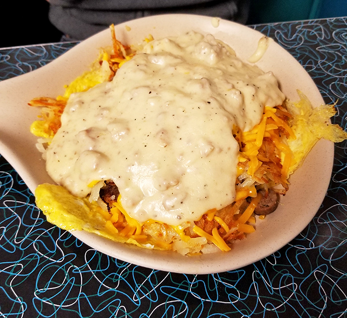 The breakfast skillet arrives like a golden sunrise, promising to fuel your day with serious satisfaction.