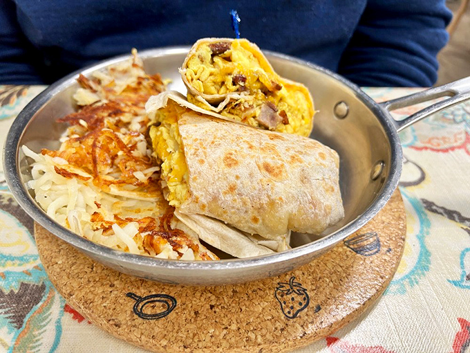 Breakfast's greatest hits wrapped in a tortilla. The skillet presentation says, "Yes, we take breakfast seriously around here."