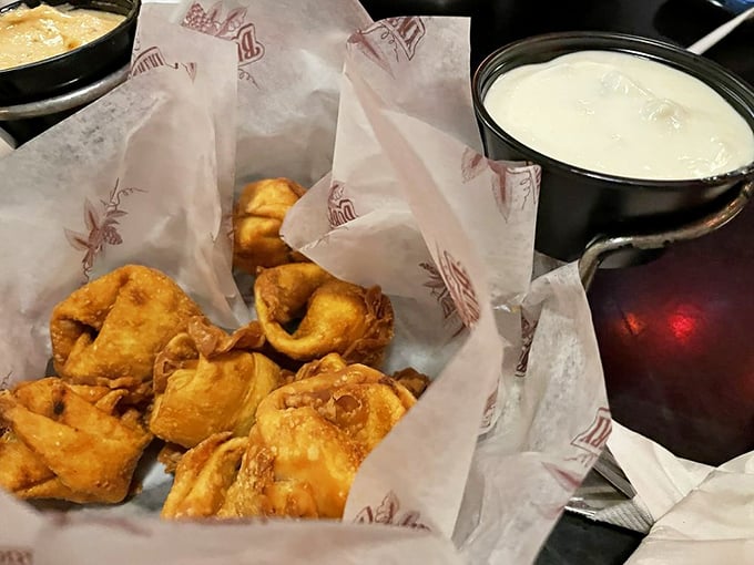 Golden-fried appetizers that crunch like autumn leaves, paired with a dipping sauce that makes you wonder why you'd ever eat anything else.