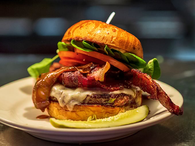 The famous Redcoat burger arrives like a beautiful, towering sculpture &ndash; a testament to beef artistry topped with melty cheese and crisp vegetables.