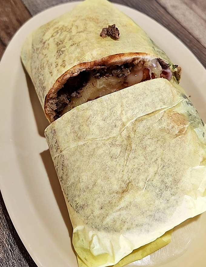 This burrito isn't just a meal, it's a commitment. Wrapped tight like a culinary present, it's what food hugs would look like if they existed.