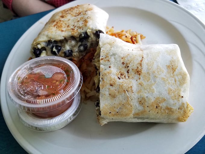 The breakfast burrito: where morning ingredients find themselves wrapped in a warm tortilla embrace, ready to fuel your Michigan adventures.