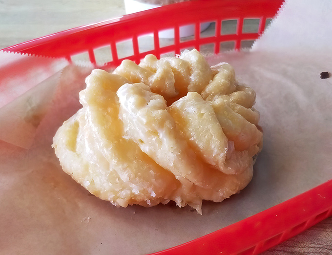 That perfect golden hue whispers promises of tender, fluffy perfection waiting within each bite.