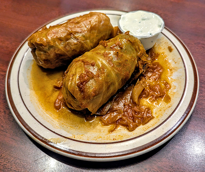 Cabbage rolls nestled together like old friends catching up over dinner.