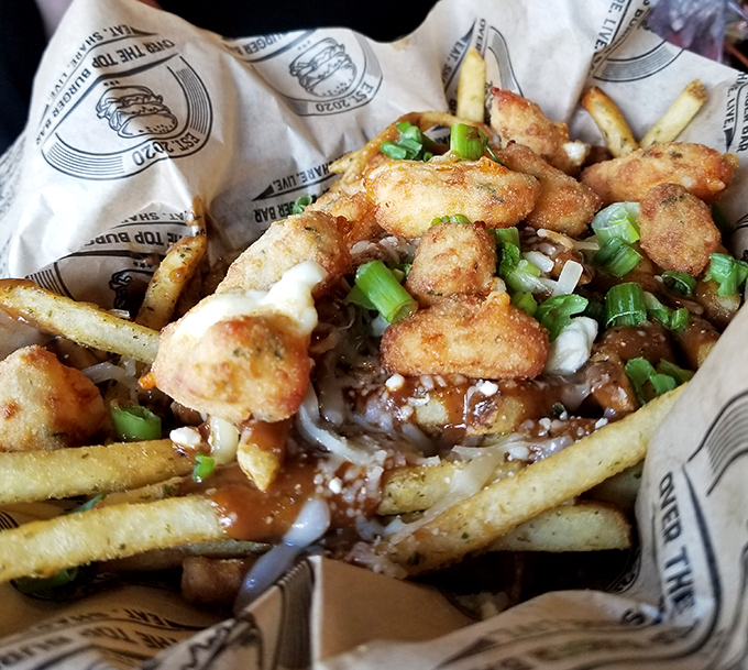 Funnel cake fries that would make state fair vendors weep with jealousy. Dessert masquerading as an appetizer is the kind of rebellion we can support.