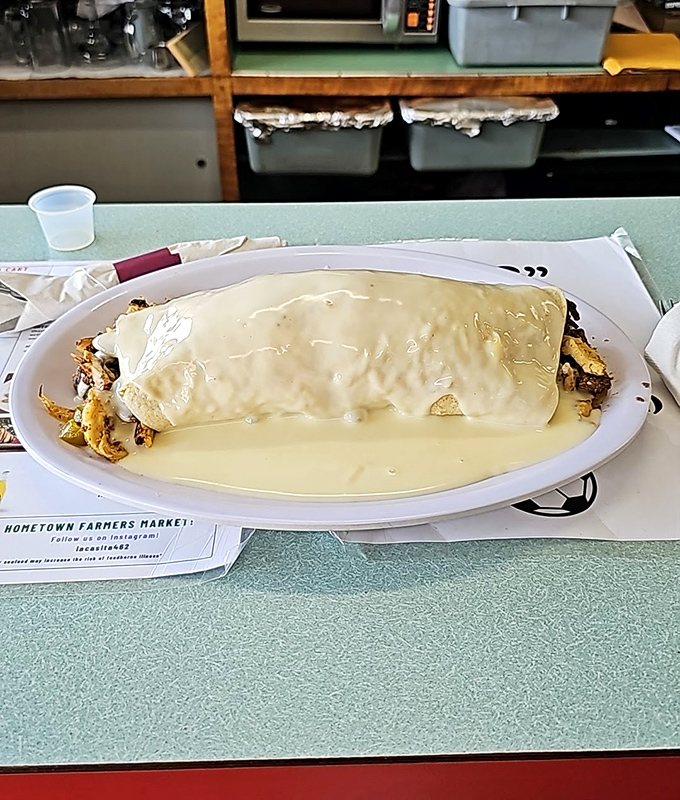 Behold the California Burrito in all its cheese-smothered glory. This isn't a meal&mdash;it's a commitment, and one worth making.