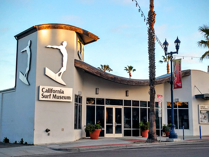 The California Surf Museum celebrates wave-riding culture with its iconic surfer silhouette. Inside, surfing history comes alive through boards, stories, and legendary personalities.