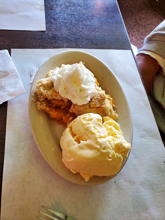 Pie &agrave; la mode: where warm apple filling meets cold ice cream in a temperature tango that proves opposites really do attract, especially in dessert form.