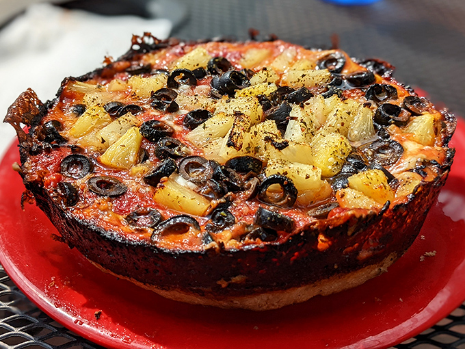 The legendary caramelized crust in all its glory &ndash; where cheese meets pan in a beautiful marriage of flavor and texture.