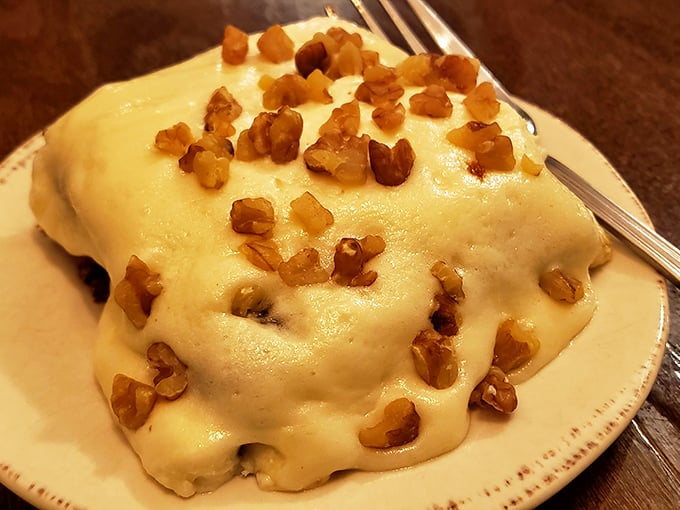 Carrot cake elevated to an art form with cream cheese frosting and walnuts. Diet plans have been known to mysteriously disappear here.