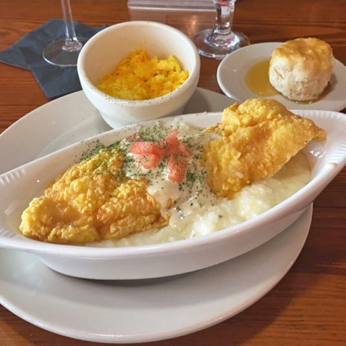 Fish and grits&mdash;a Southern classic elevated. That golden catfish perched atop creamy grits is the aquatic equivalent of hitting the culinary lottery.