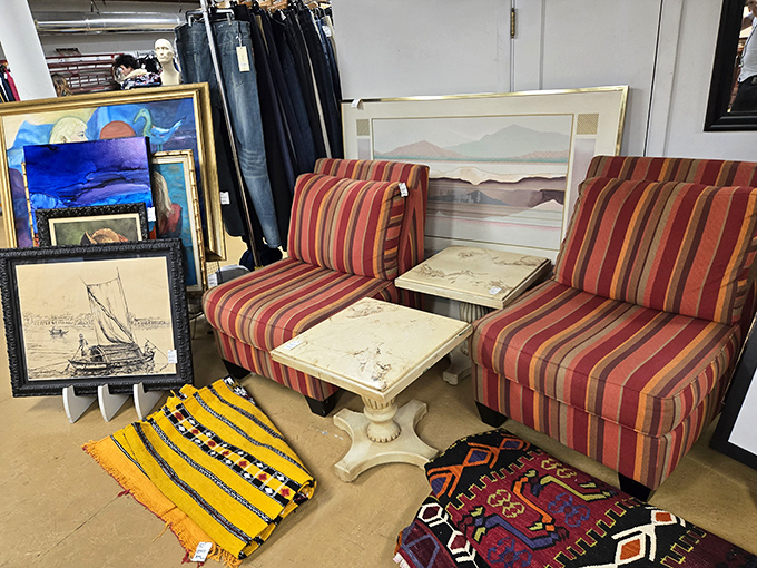 The secondhand furniture gallery&mdash;where striped chairs and framed landscapes create unexpected combinations that somehow just work.