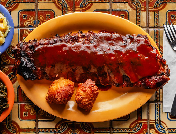 Ribs so tender they practically surrender to your fork. That sauce isn't just red&mdash;it's a flavor declaration.