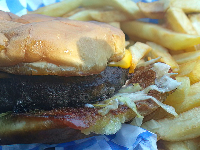 This isn't just a burger – it's a masterclass in simplicity. Perfectly grilled patty, melted cheese, fresh toppings, and fries that deserve their own fan club.